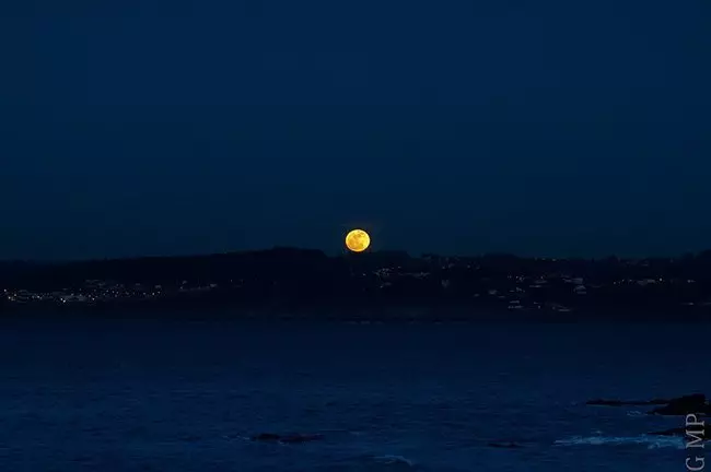 full moon over the bay